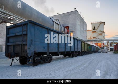 Freight gondola cars for limestone loading stand at factory Stock Photo ...