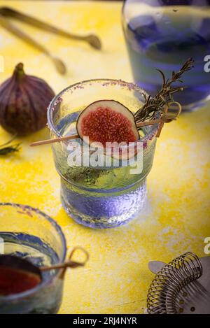 Purple fig cocktail or mocktail in glass Stock Photo - Alamy