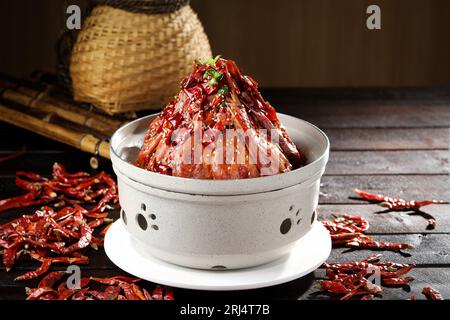 Griddle Cooked spicy duck head Stock Photo - Alamy