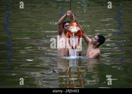 Nag Panchami Snake festival ; Water offering to cobra snake ; battis ...