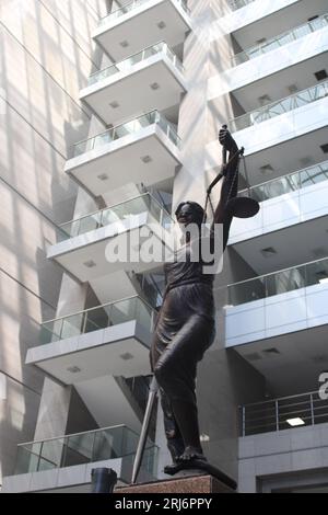 Statue of a female judge representing justice and law inside the ...