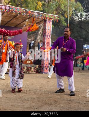 The Sindhi folk dancers participating at Lok mela Stock Photo - Alamy