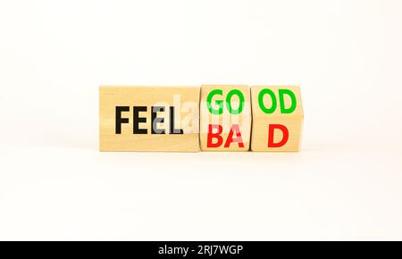 Feel good or bad symbol. Businessman turns wooden cubes and changes ...