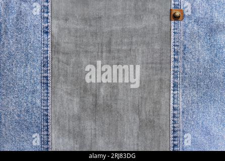Blue denim borders with a seam and leather label. Light blue color ...