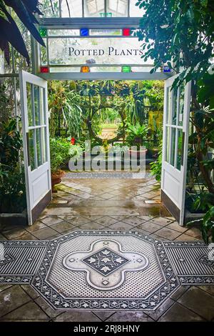 Open white doors leading to Potted Plants section with moon gate inside ...