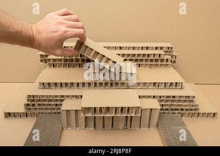 Basic architectural cardboard house model in three dimensions from the ...