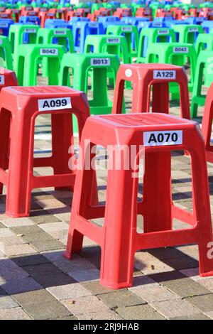 Plastic stools in the square in a park, north china Stock Photo - Alamy
