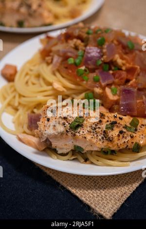Delicious pasta topped with toppings Stock Photo - Alamy