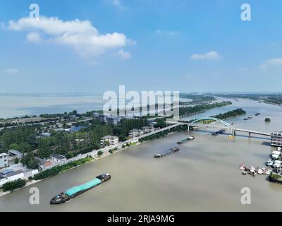 Aerial photo shows the cargo ship traveling in the Baoying section of ...