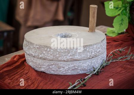 Hand mill stone or mola manuaria, portable mill used in ancient roman ...