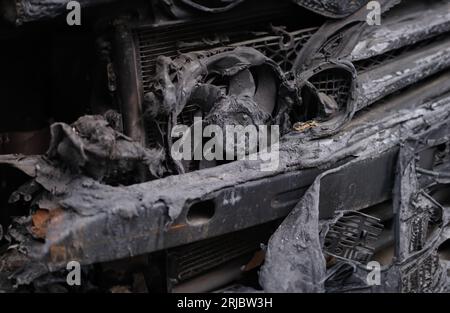 Burnt engine compartment of modern car closeup Stock Photo - Alamy