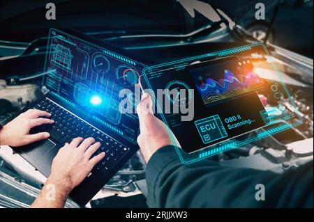 Auto mechanic checking ECU engine system with OBD2 wireless scanning ...