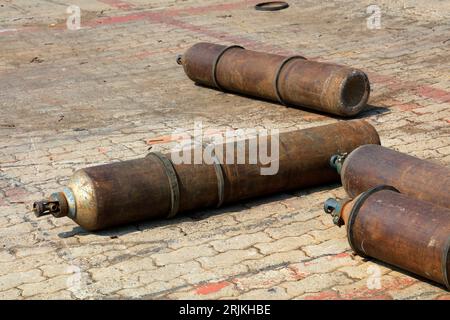 Oxidizing rusty oxygen bottles Stock Photo - Alamy