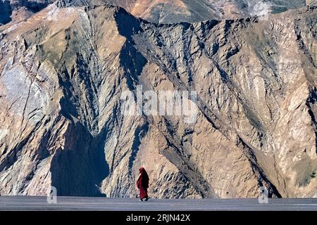 Monk under the mountain, Lingshed, Zanskar, Ladakh, India Stock Photo ...