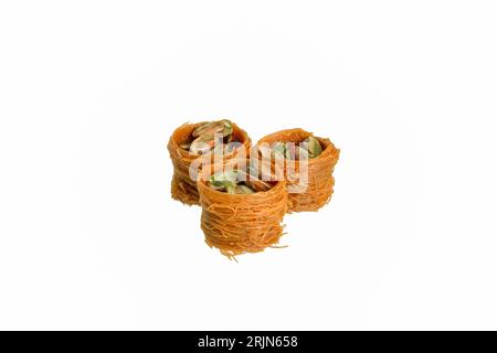 Syrian Turkish sweet (Ish Al Boulbol or Taj AL Malek) isolated on white ...