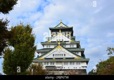 A low angle shot of the Osaka Castle during autumn in Osaka, Japan ...