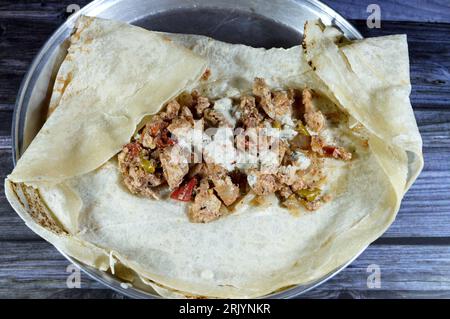 Preparing Syrian recipe cuisine background, chicken shawerma or ...