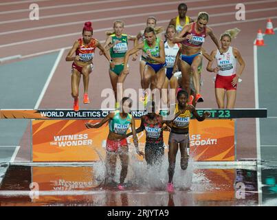 Faith Cherotich of Kenya, Sembo Almayew of Ethiopia and Winfred Yavi of ...