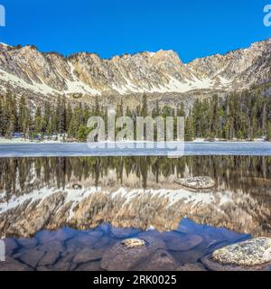 upper twin lake thawing in spring below a headwall in the pioneer ...