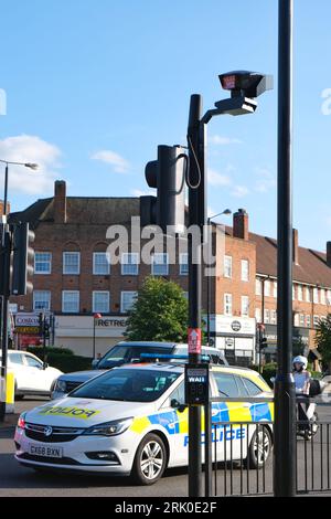 London, UK. A ULEZ camera is covered with a sticker labelling it as a ...
