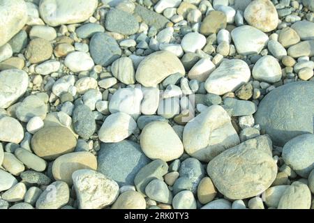 Stones of different size and color, sea stones, big and small stones ...