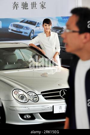 Hostess on Car Fair in Belgrade Stock Photo - Alamy