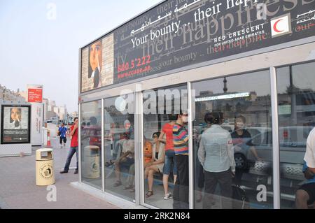 Air conditioned bus stops in Dubai Stock Photo - Alamy