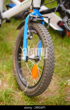 A closeup shot of details on a spinning plastic rainbow pinwheel Stock ...