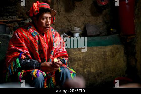 The people working, wearing traditional Peruvian dresses Stock Photo ...