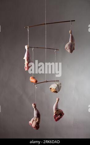 hanging chicken legs Stock Photo - Alamy