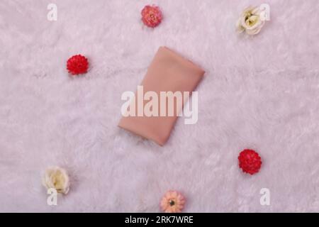 folded hijab on white background. colour variation of pashmina, hijab ...