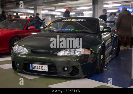 A second-generation green Mitsubishi Eclipse, tuned in style of Brian O ...
