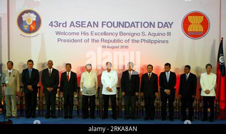 Philippine Foreign Secretary Alberto Romulo, left, speaks during the ...