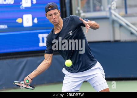 Giovanni Mpetshi Perricard of France returns the ball to Taylor Fritz of the U.S. during their ...