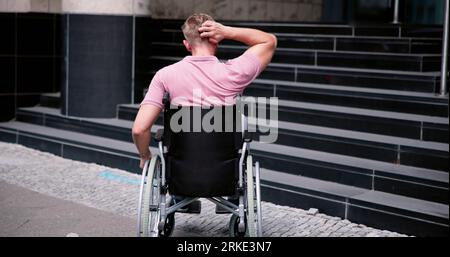 Paralyzed Man With Disability Stair Access Problem Stock Photo - Alamy