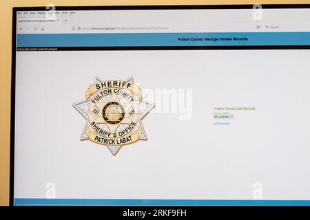 Fulton County Sheriff Patrick Labat surveys the scene in front of the ...