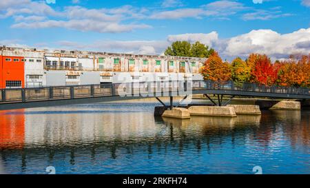 Bridge and warehouse, with bright maple trees, in Montreal, Canada ...