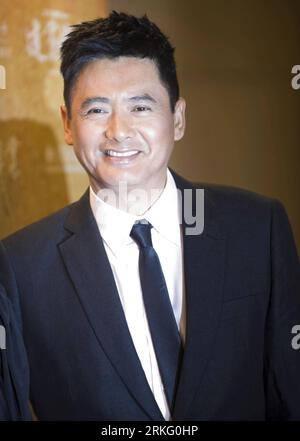 Hong Kong actor Chow Yun-fat, left, Chinese actress and hostess Yu ...