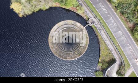 Aerial view of Ladybower Reservoir with scenic countryside and blue sky ...
