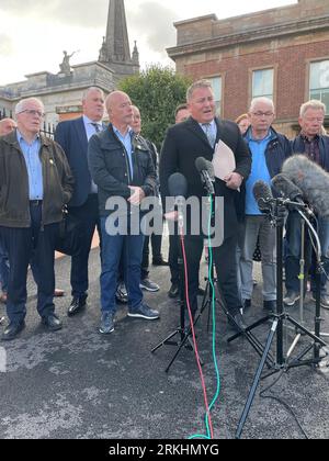 Lawyer Ciaran Shiels with the families of Bloody Sunday victims outside ...