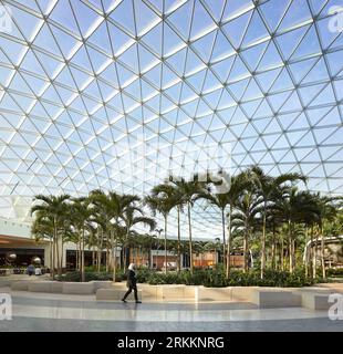 Curved mall interior. 360 Mall, Kuweit City, Kuwait. Architect: CRTKL ...