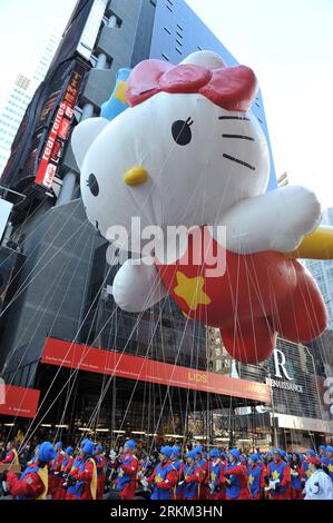 The Hello Kitty balloon floats in the Macy's Thanksgiving Day Parade on ...