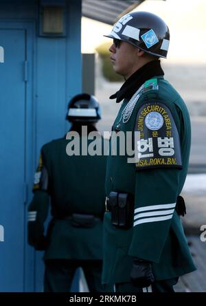 Dec 22, 2011-Paju, South Korea-North Korean soldiersvstand guard with ...
