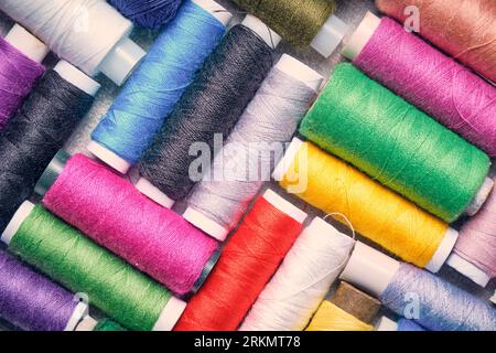Set of multicolored threads for cutting, sewing Stock Photo - Alamy