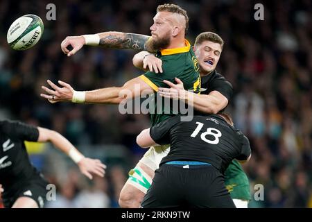 New Zealand's All Blacks Fletcher Newell scores a try as he is tackled ...
