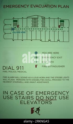 Generic classic school office building evacuation plan signage. Exit ...