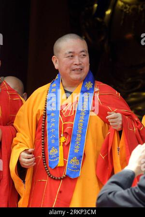Shi Yongxin, abbot of Shaolin Temple, is pictured during the first ...