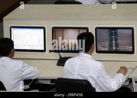Technicians inside the General Satellite Control Center in NK Stock ...