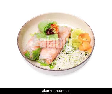 Delicious spring rolls wrapped in rice paper isolated on white Stock ...