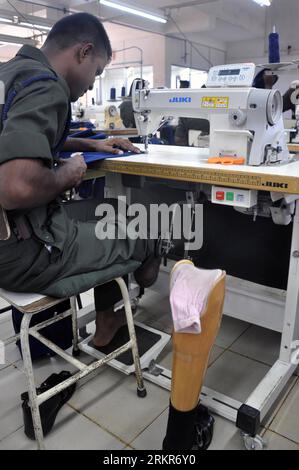 Sri Lankan disabled Army soldiers participate in a 100 meters race ...